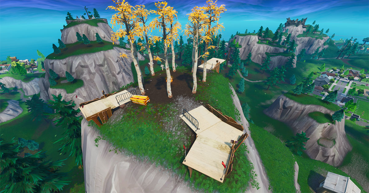 Localização da montanha com um círculo de árvores no Fortnite